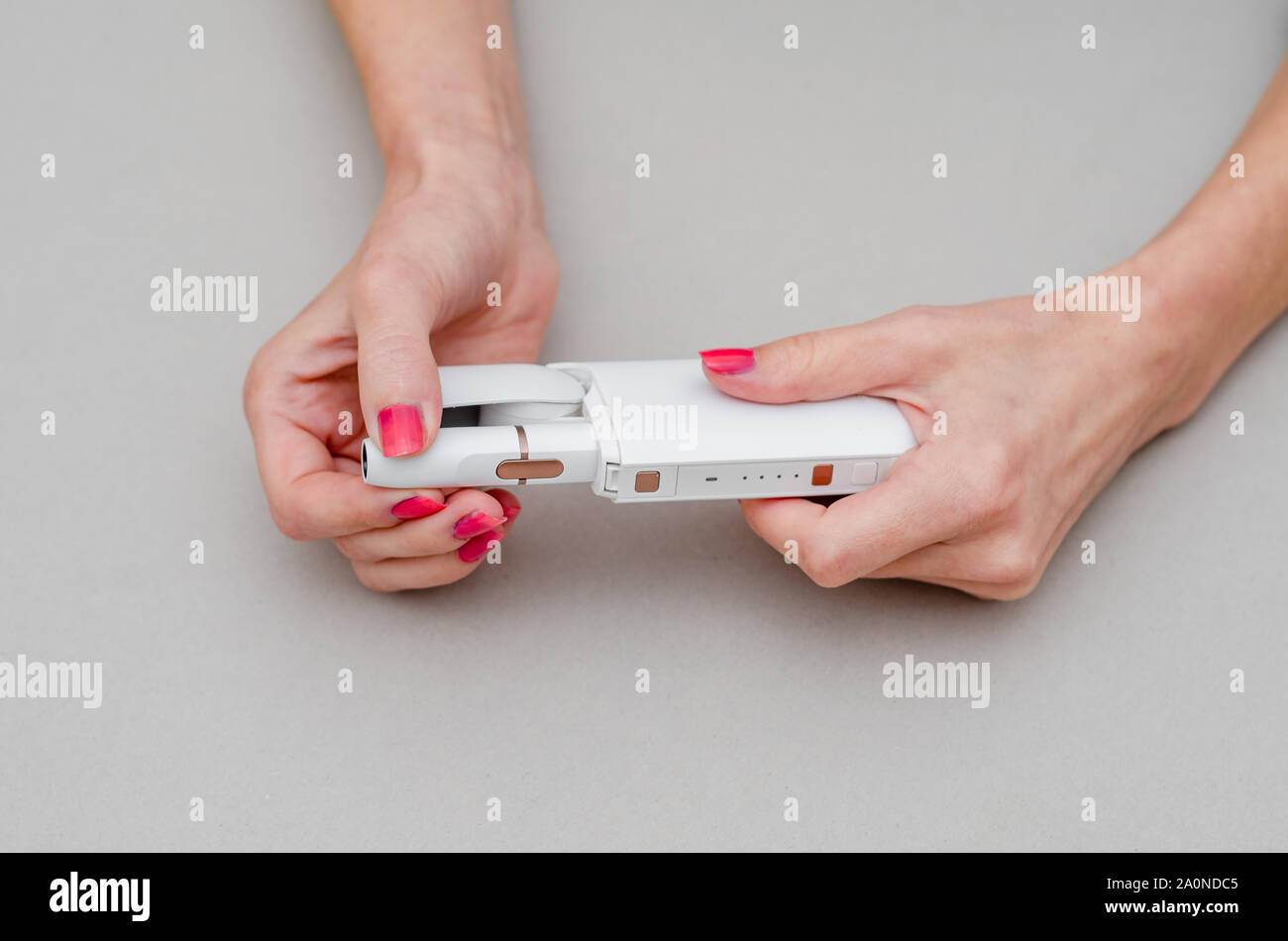 Blond female smoking cigarette hi-res stock photography and images - Alamy