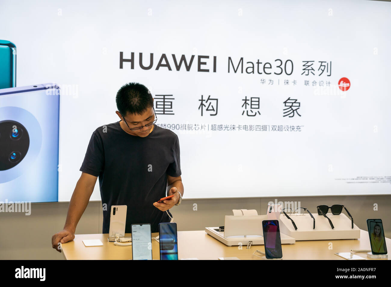 Customer at a Chinese multinational technology company Huawei store in ...