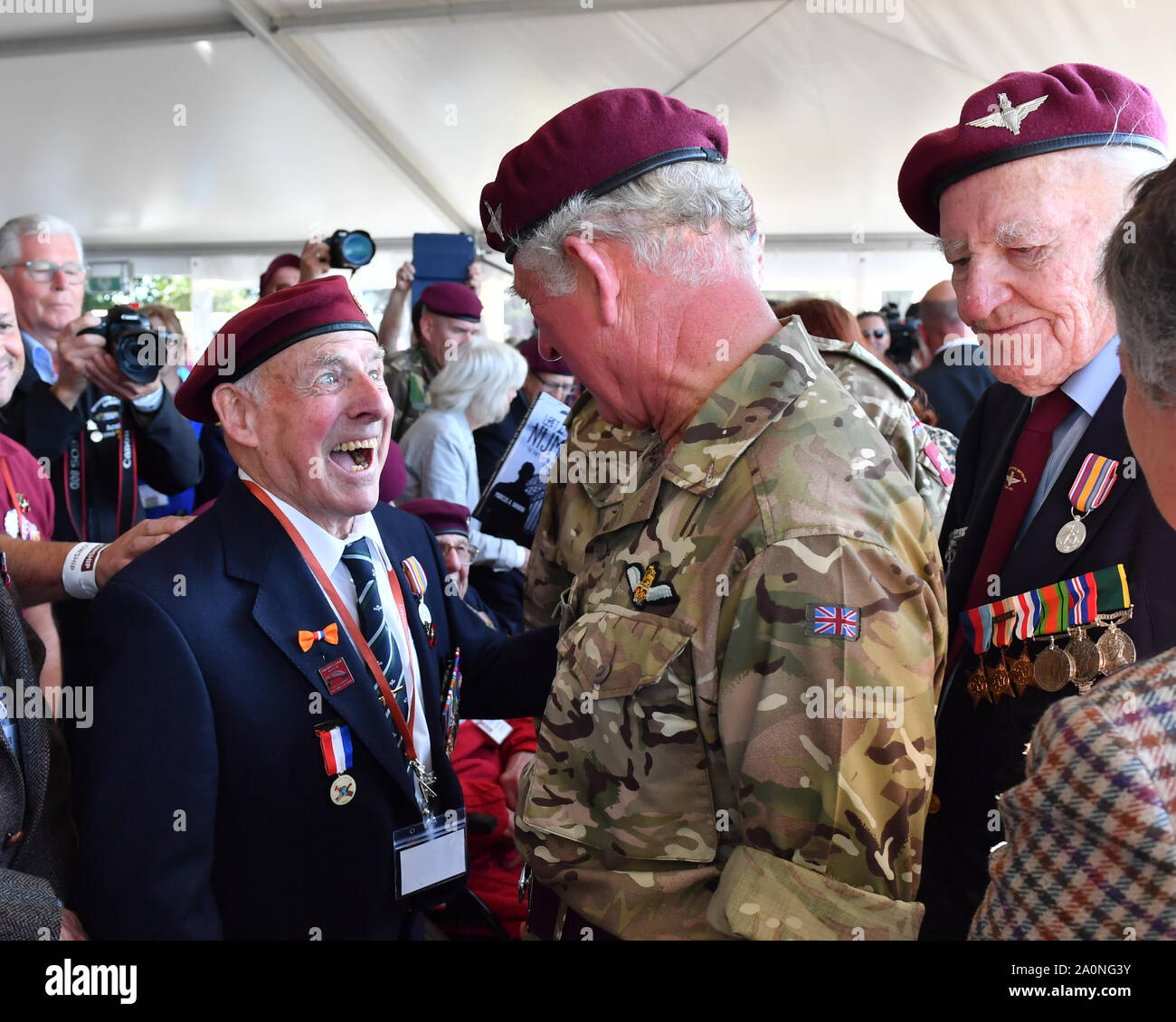 Prince Charles talks to a Parachute Regiment veteran attending the ...