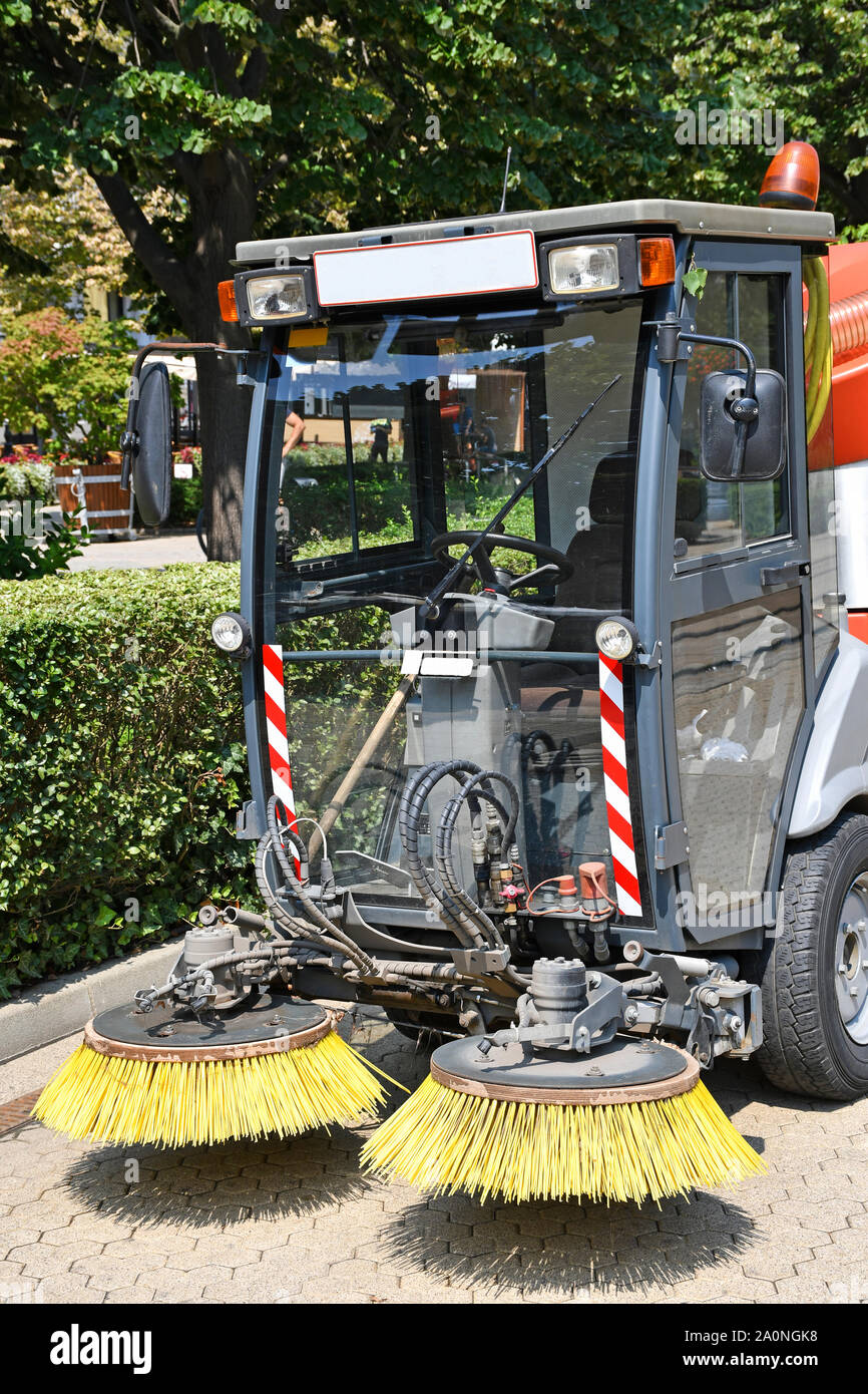 Street cleaner vehicle on the road Stock Photo - Alamy