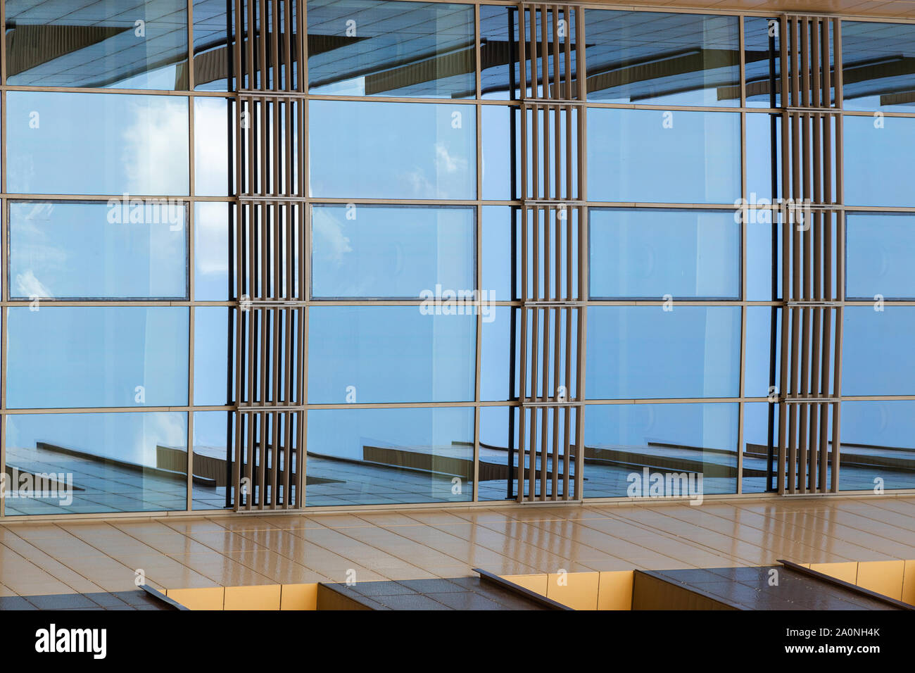 Ground view of reflective glass surface of modern building Stock Photo ...