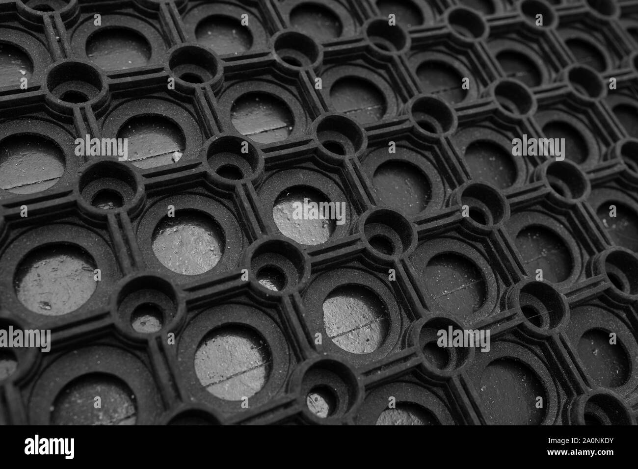 A black rubber mudmat with a depth of field Stock Photo - Alamy