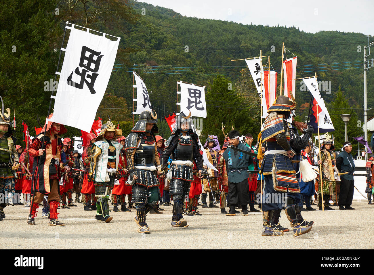 Many Japanese reenactors dressed in traditional samurai costume and ...