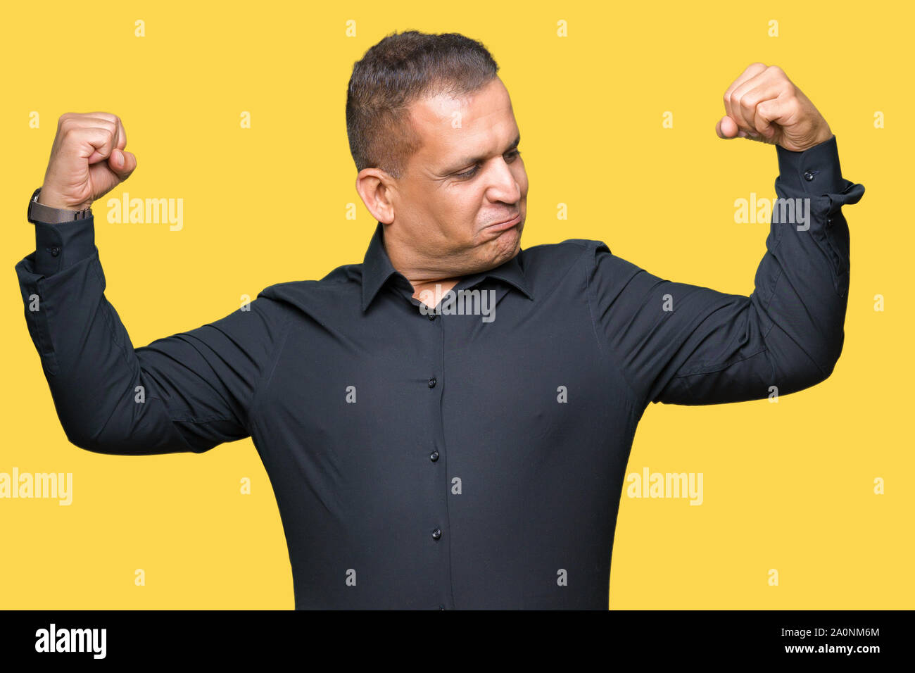 Handsome middle age arab business man over isolated background showing ...