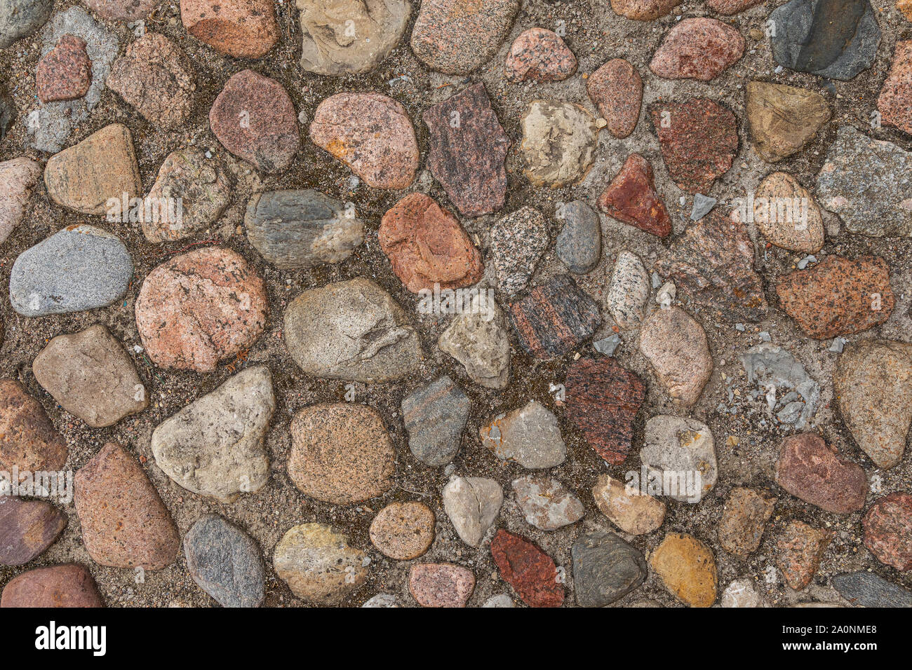 Walkway covered with multicolored stones, pattern seamless, texture ...