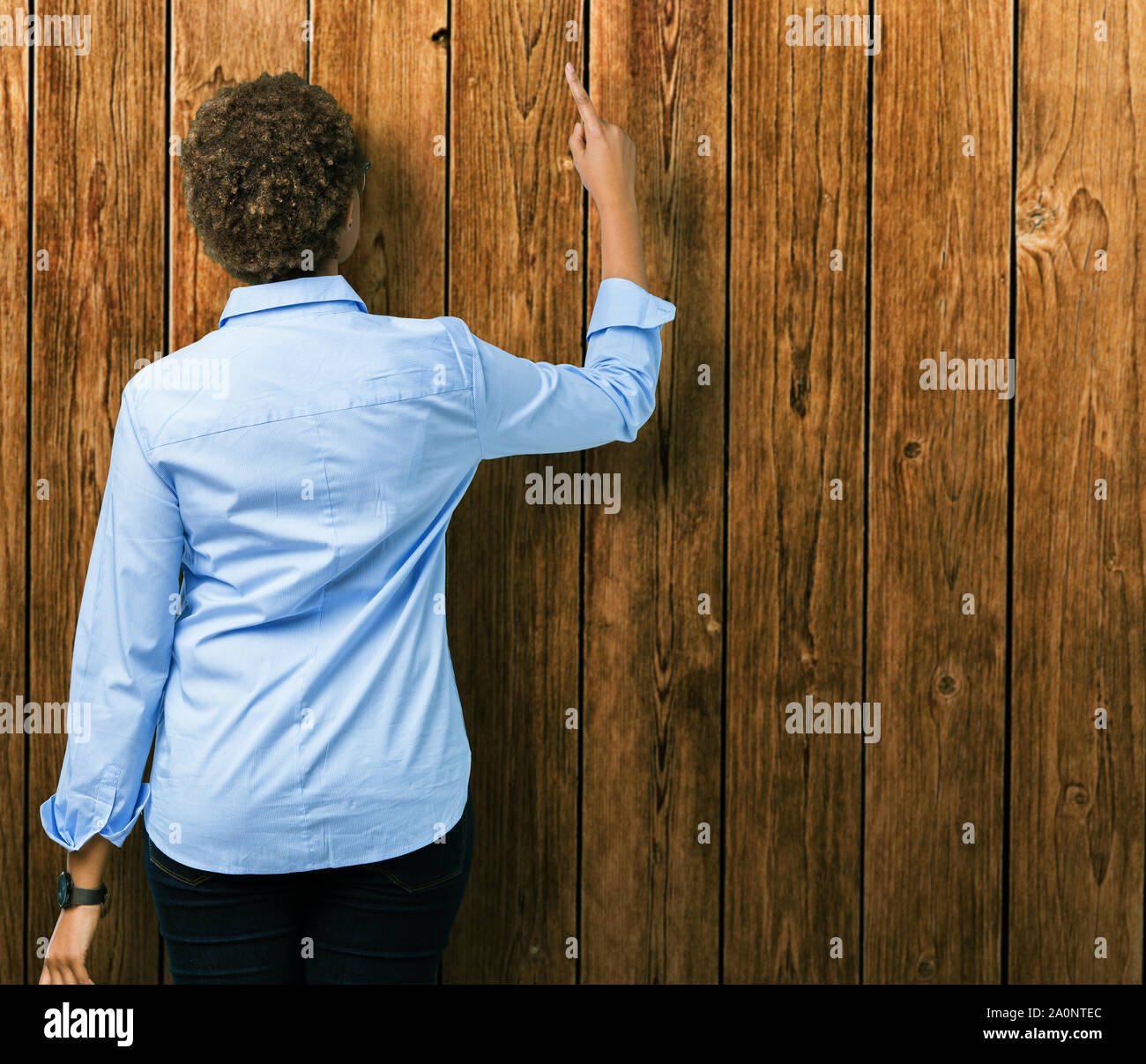 Young beautiful african american business woman over isolated ...