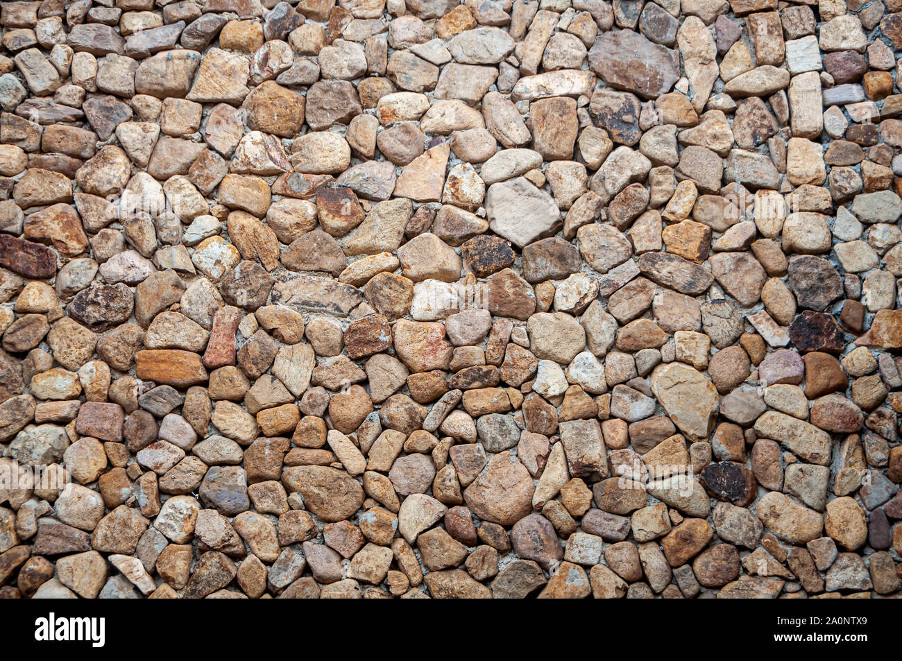 Texture of the stone wall from many different size of rock Stock Photo ...