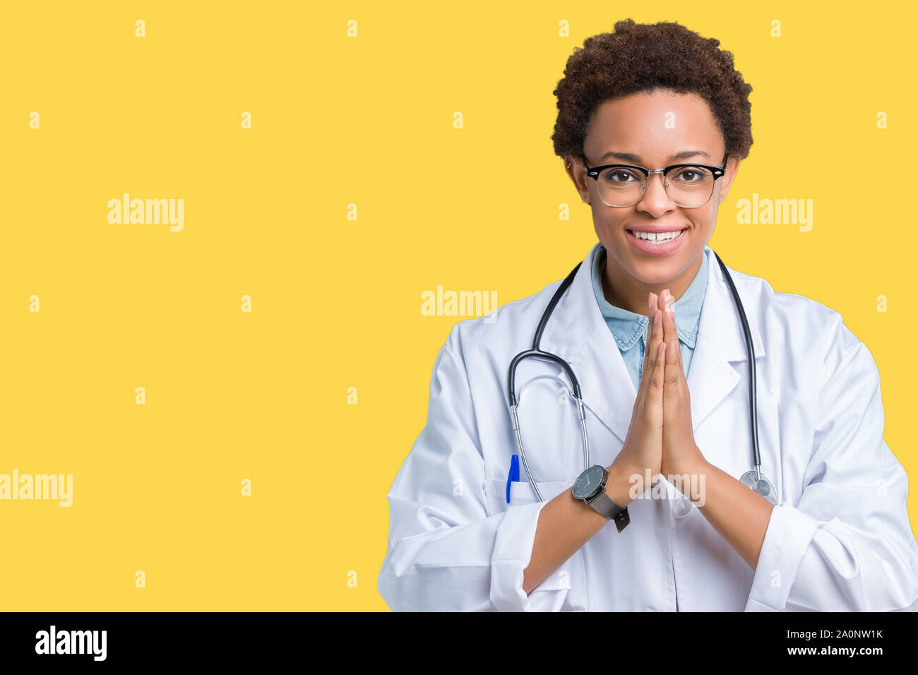 Young african american doctor woman wearing medical coat over isolated ...