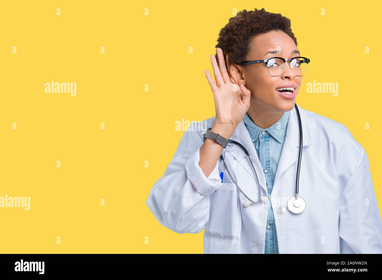 Young african american doctor woman wearing medical coat over isolated ...