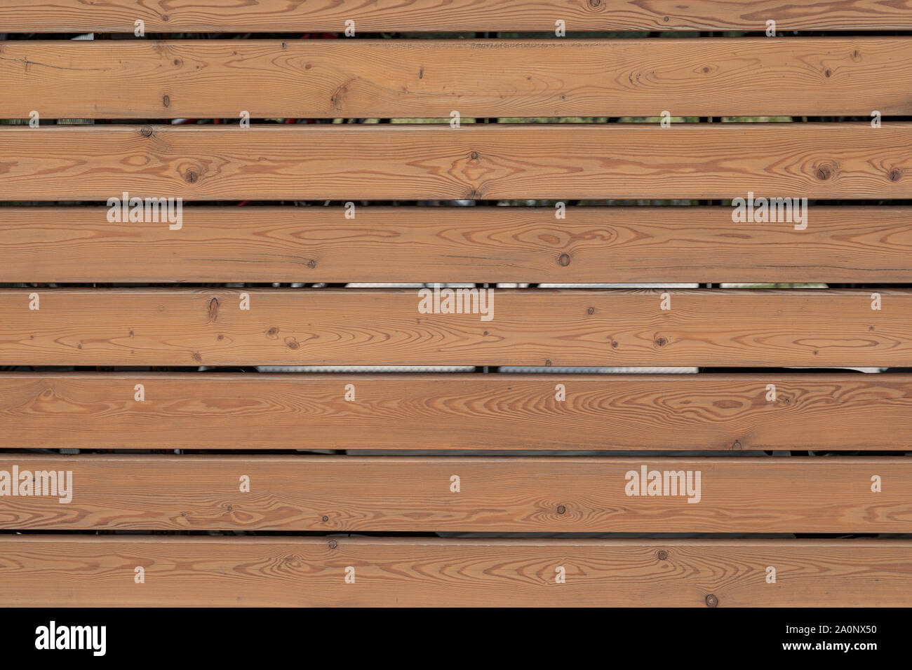 Horizontally layed wooden planks of fence in percinct of house building ...