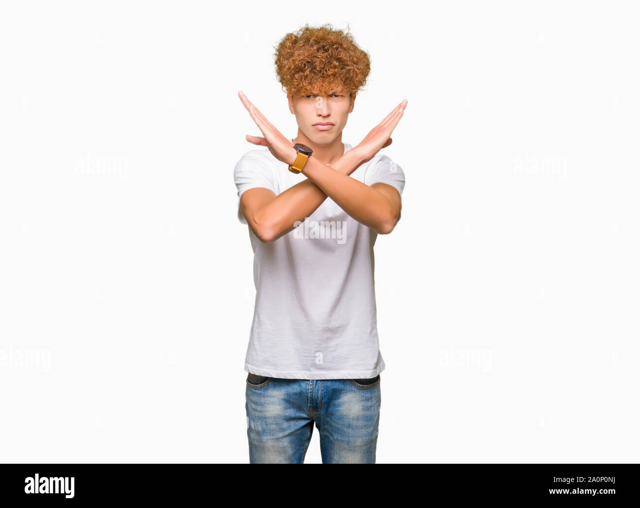 Young handsome man with afro hair wearing casual white t-shirt ...