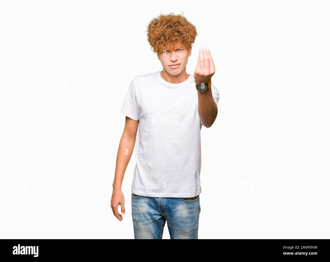 Young handsome man with afro hair wearing casual white t-shirt Doing ...