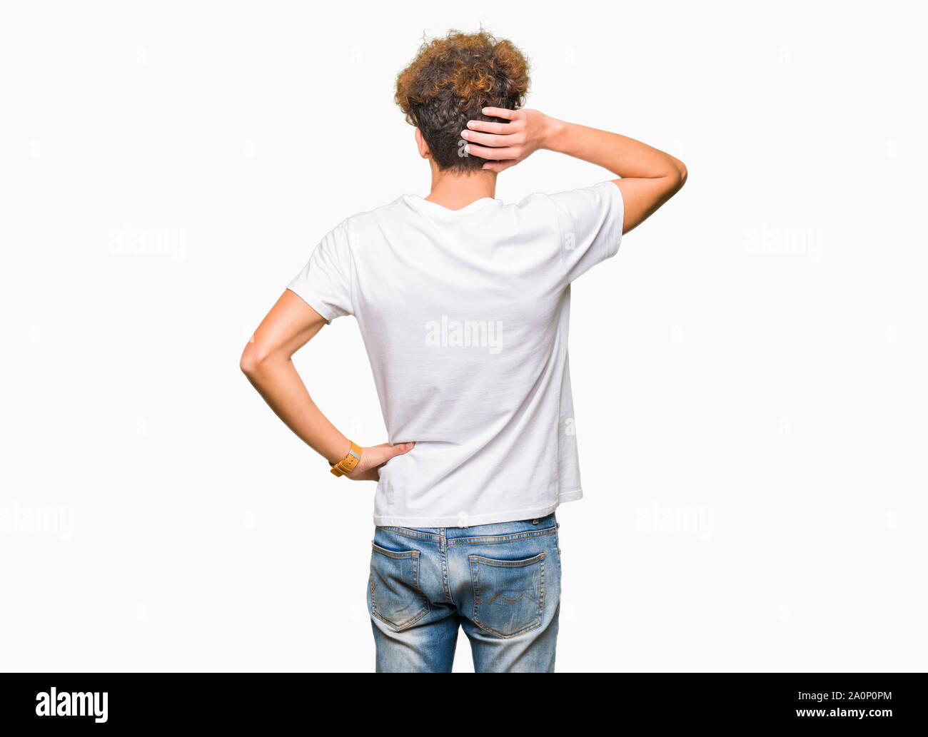 Young handsome man with afro hair wearing casual white t-shirt ...