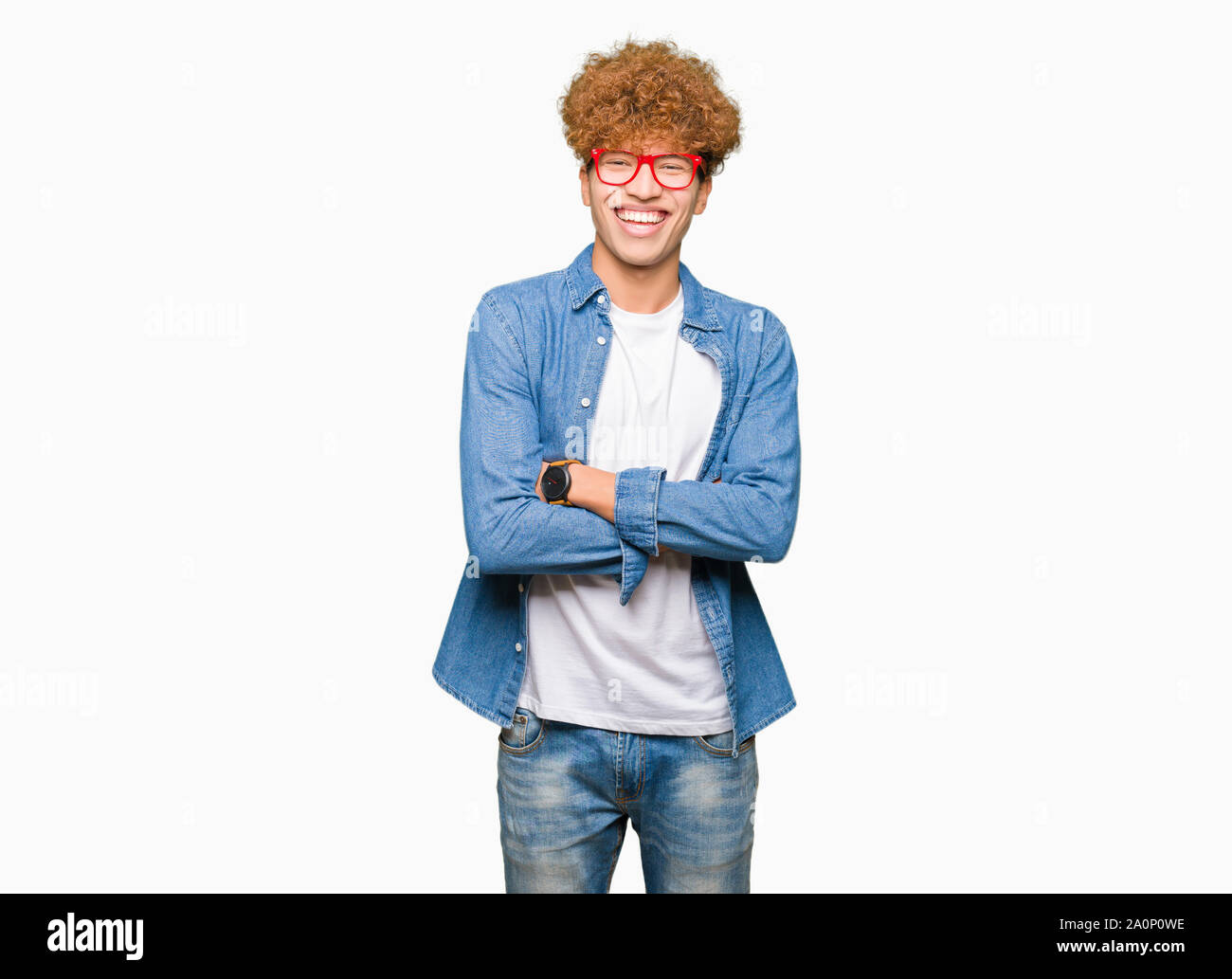 Young handsome man with afro hair wearing glasses happy face smiling ...