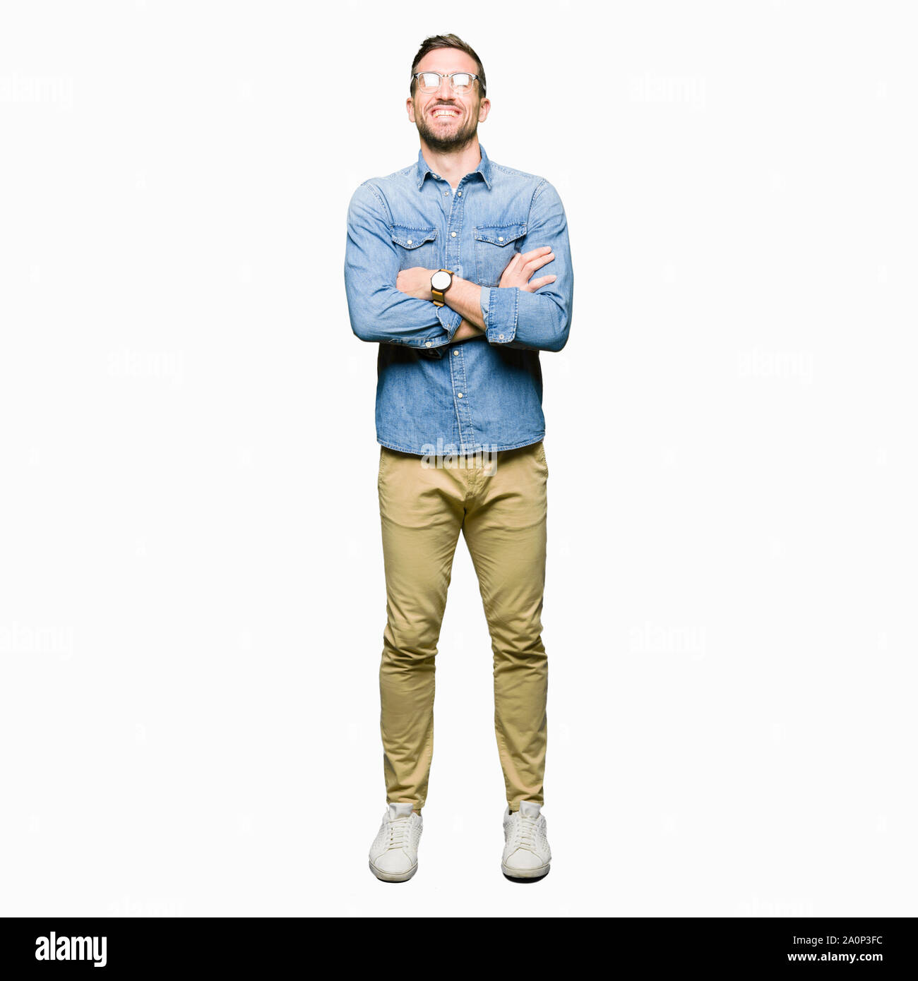 Handsome man wearing glasses happy face smiling with crossed arms ...