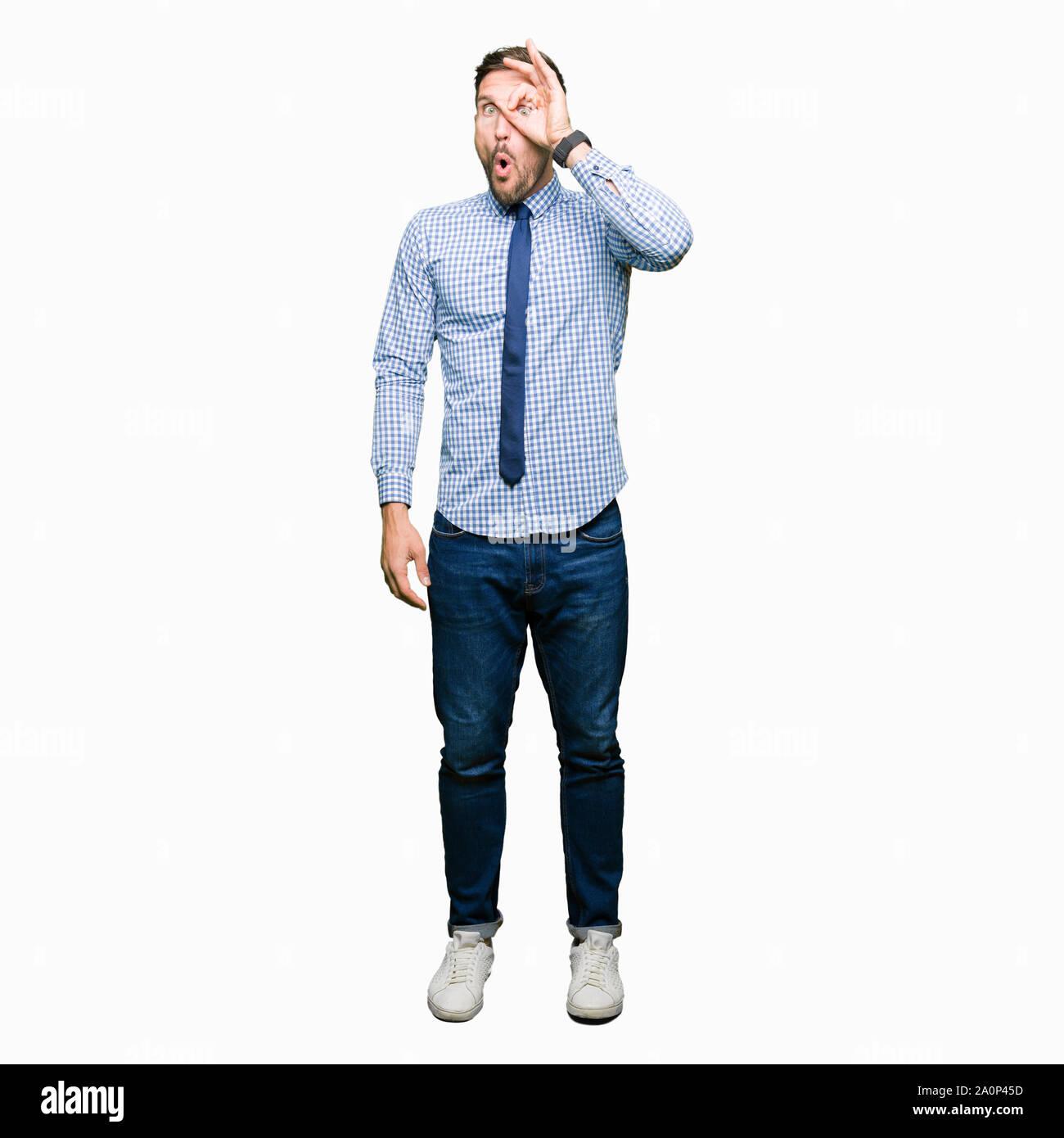 Handsome business man wearing tie doing ok gesture shocked with ...