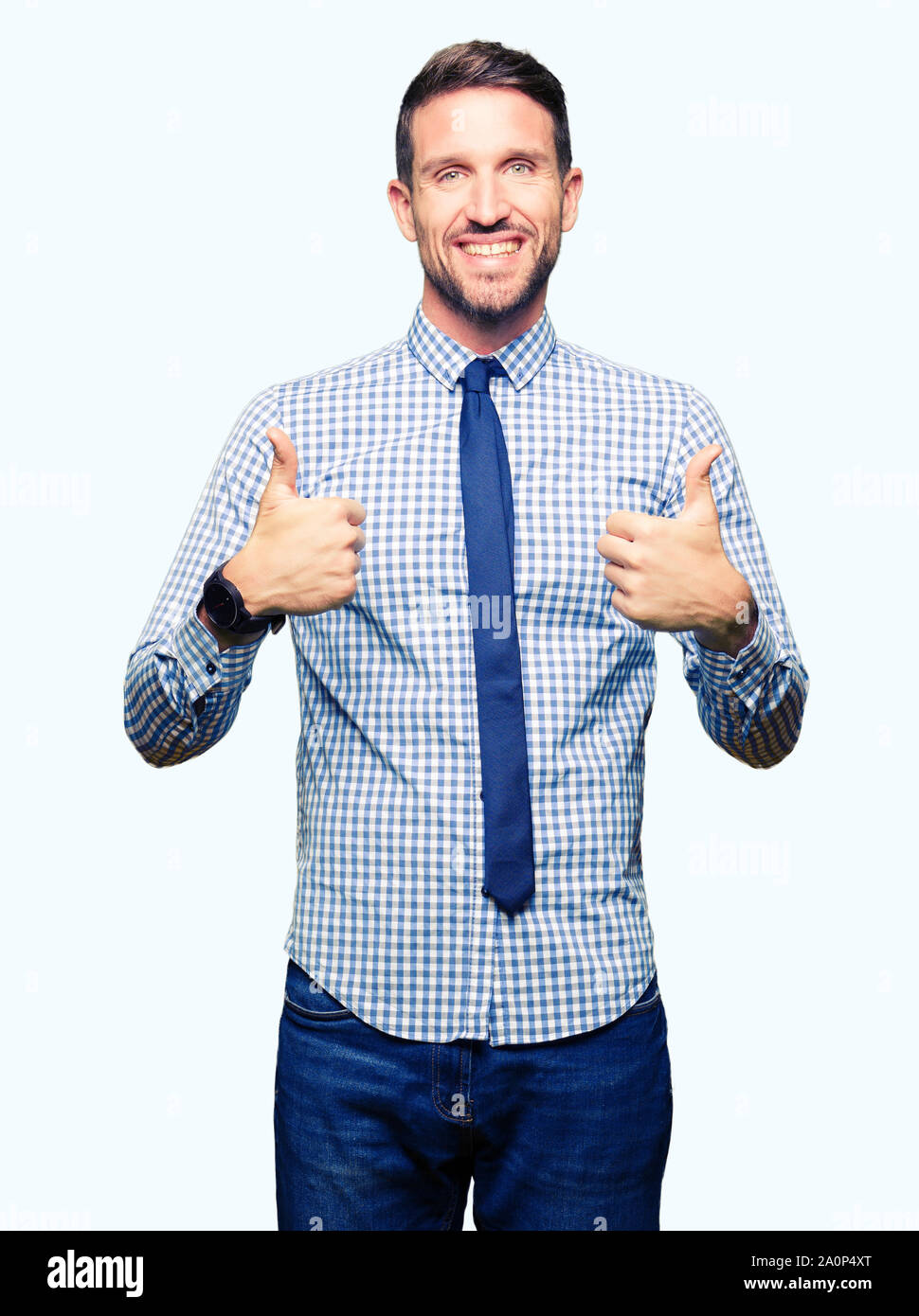 Handsome business man wearing tie success sign doing positive gesture with hand, thumbs up ...