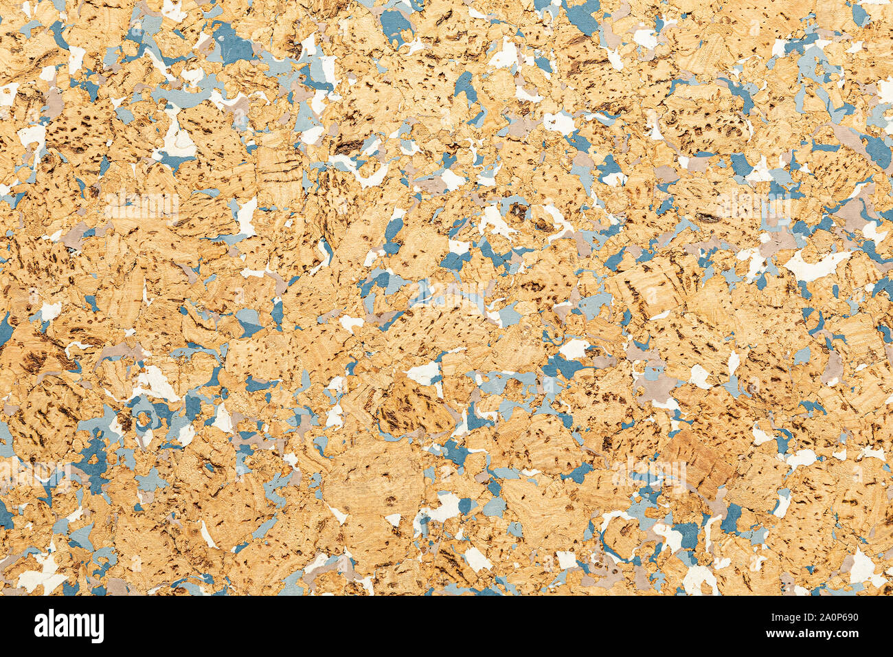Close-up of cork sound insulation material with interspersing of blue ...