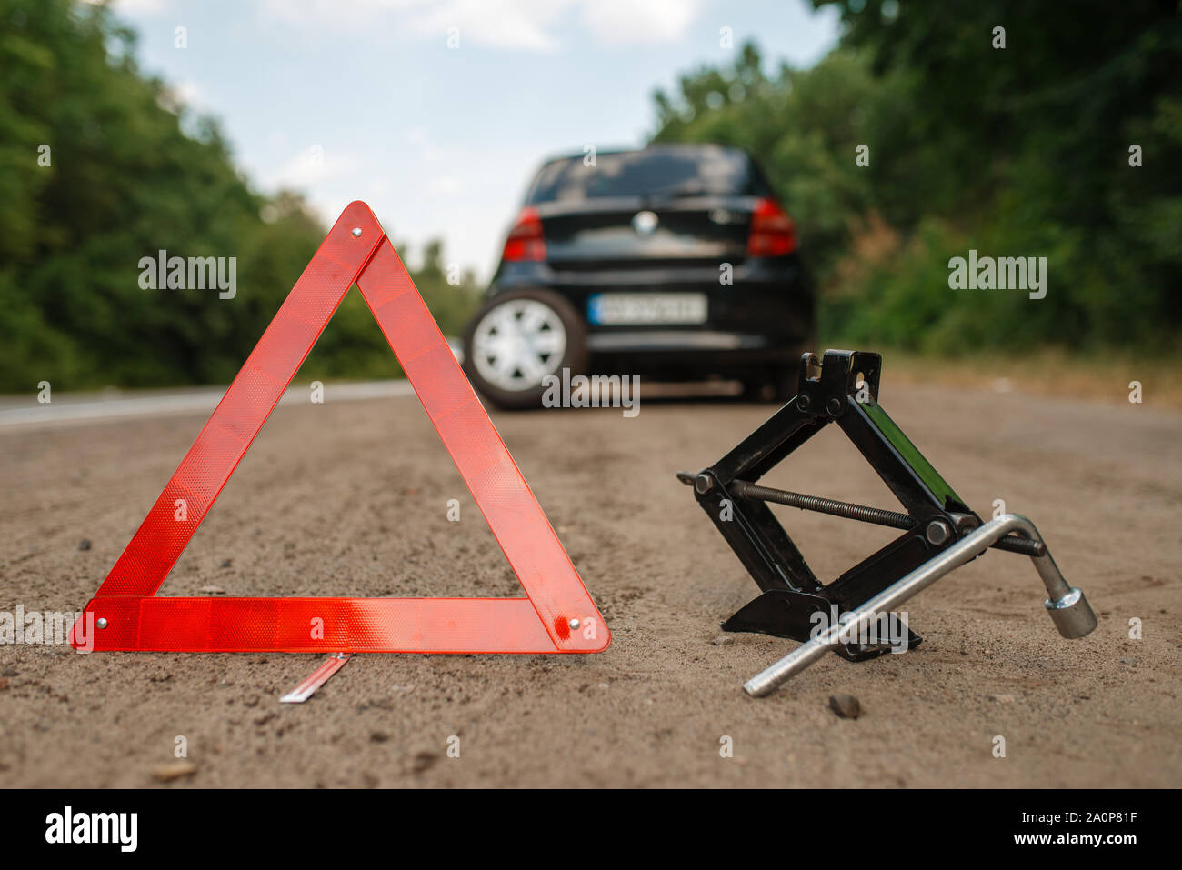 Car punctured hi-res stock photography and images - Alamy