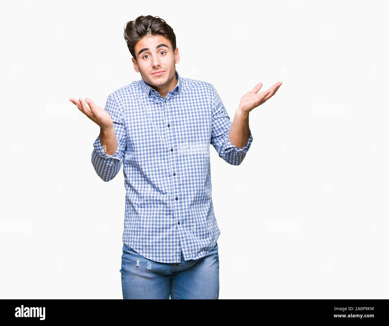 Young handsome business man over isolated background clueless and ...