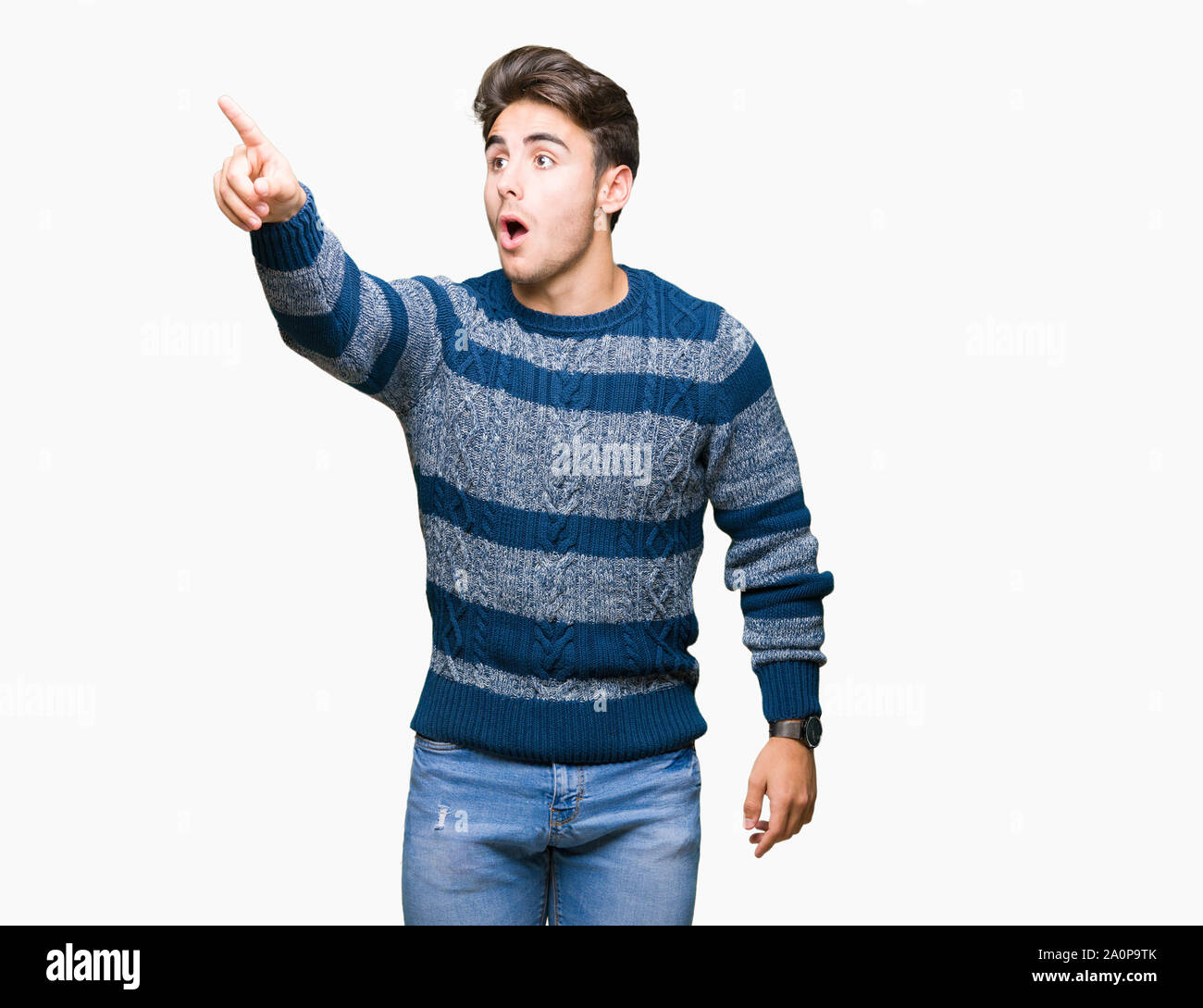 Young handsome man over isolated background Pointing with finger ...