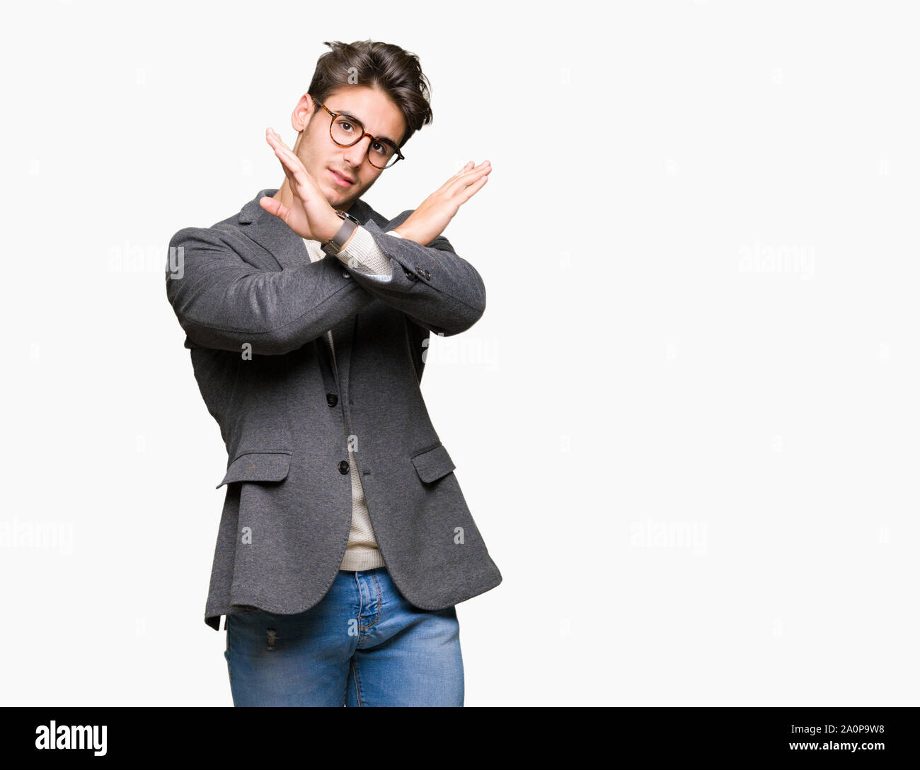Young business man wearing glasses over isolated background Rejection ...