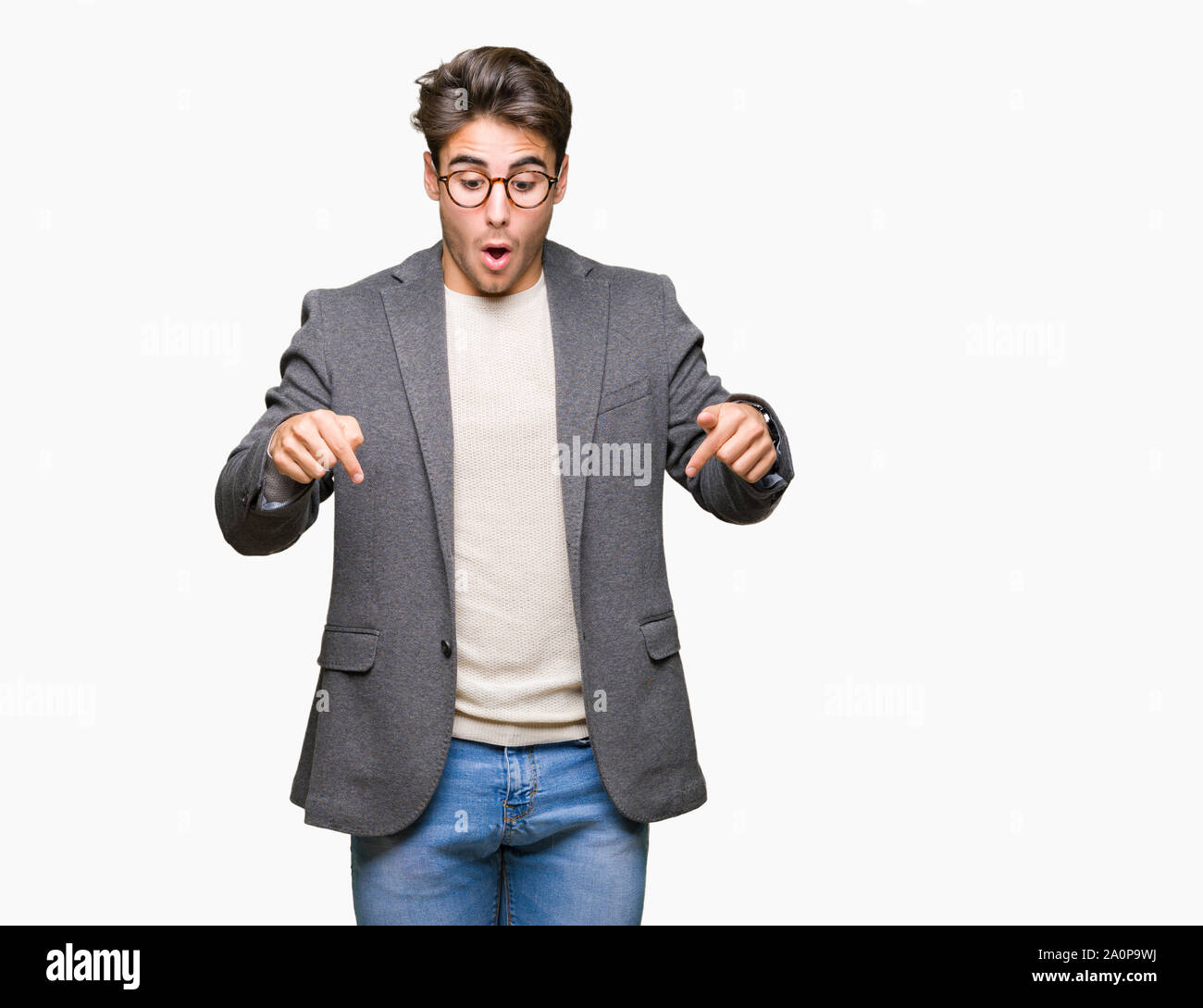 Young business man wearing glasses over isolated background Pointing ...