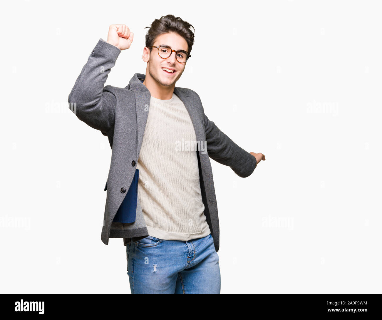 Young business man wearing glasses over isolated background Dancing ...