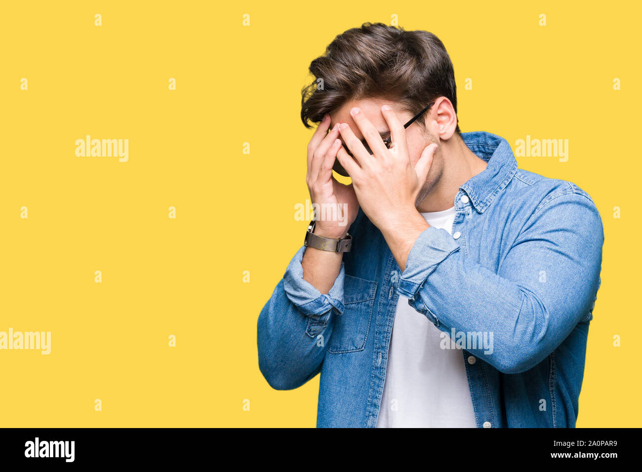 Young handsome man wearing sunglasses over isolated background with sad ...