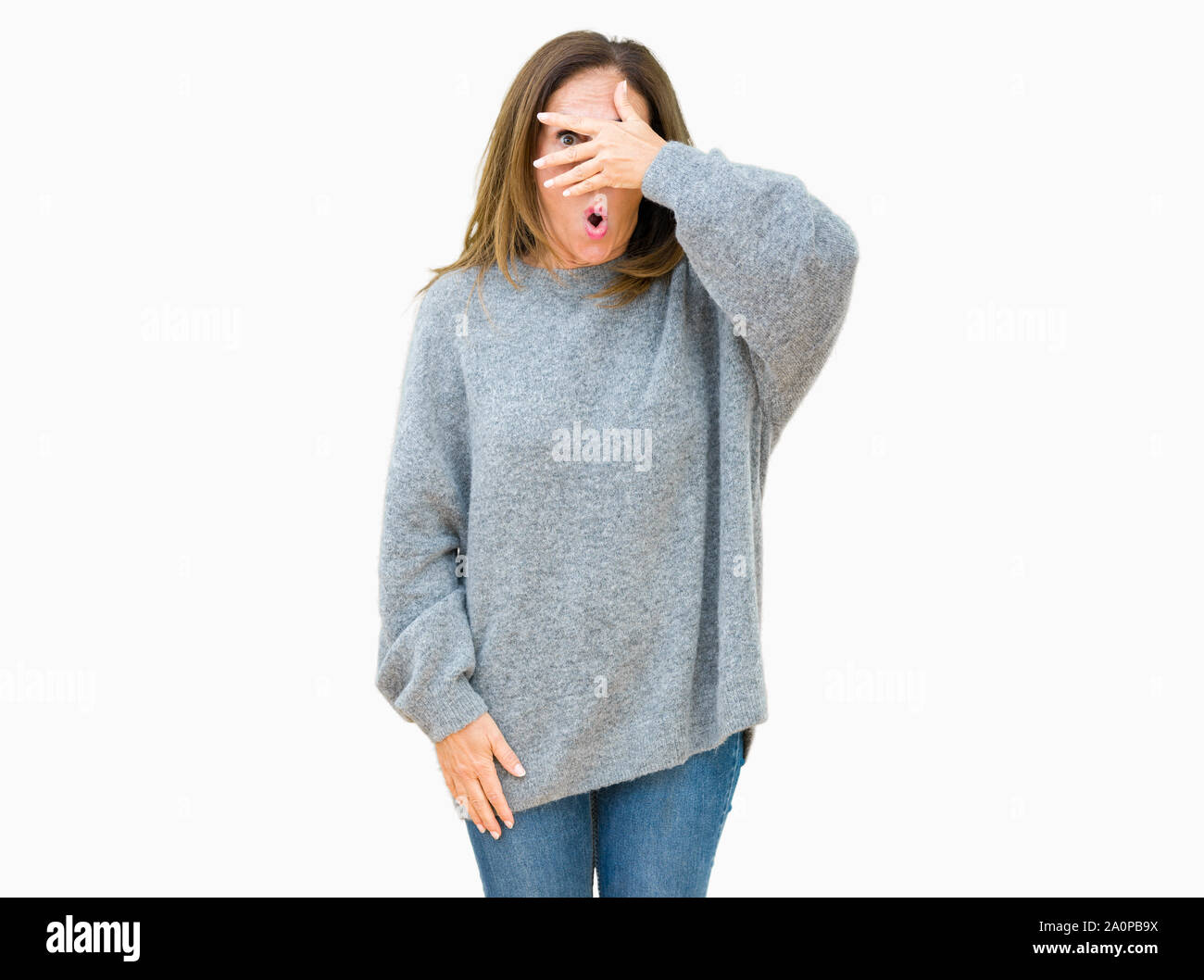 Beautiful middle age woman wearing winter sweater over isolated ...