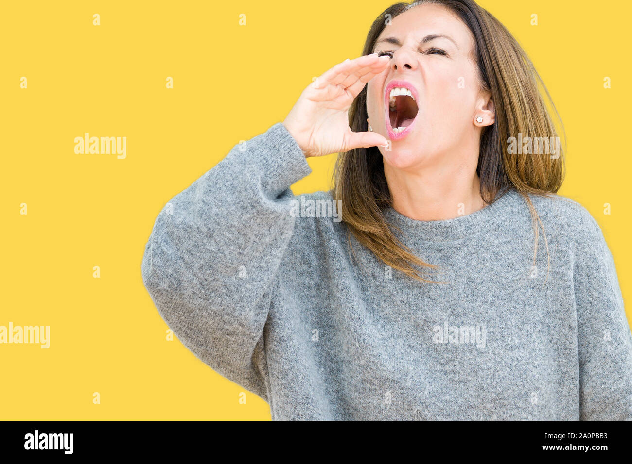 Beautiful middle age woman wearing winter sweater over isolated ...