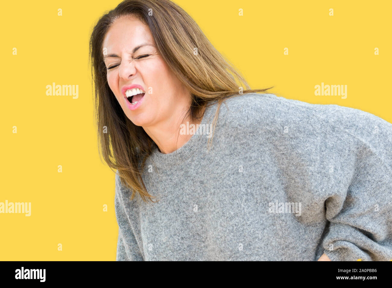 Beautiful middle age woman wearing winter sweater over isolated ...