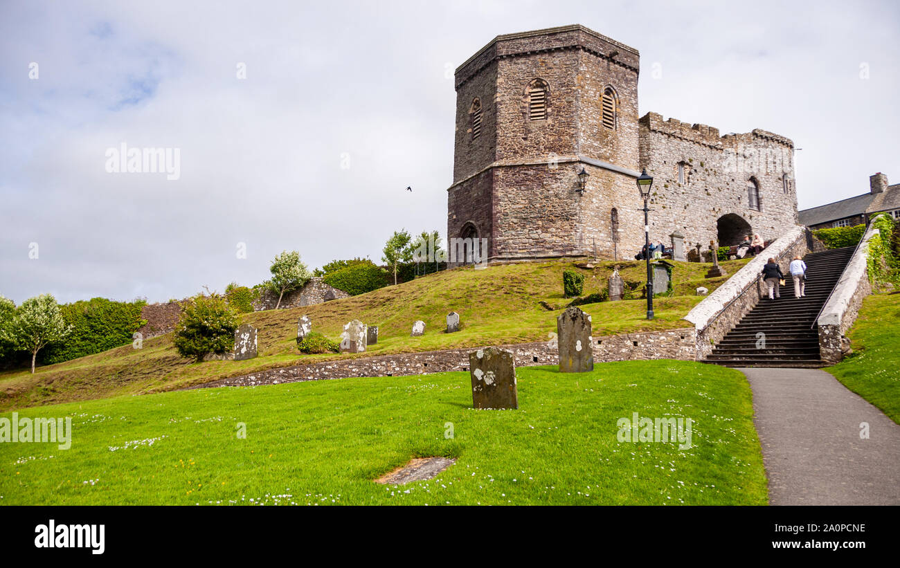 St David's, Wales, UK - May 18, 2009: Pedestrians walk past the Porth-y ...