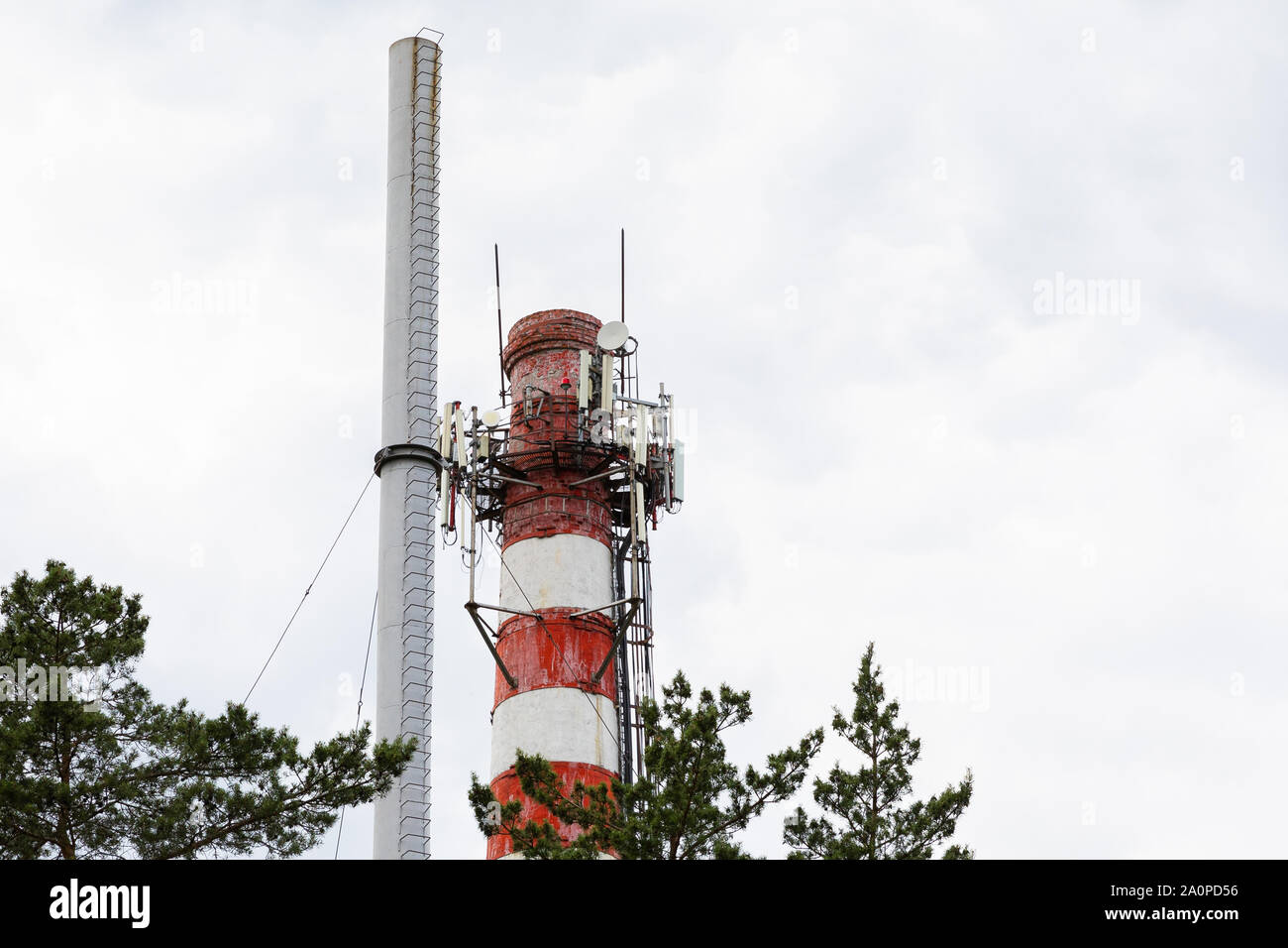 Red white chimney on blue sky with furry clouds background Stock Photo ...