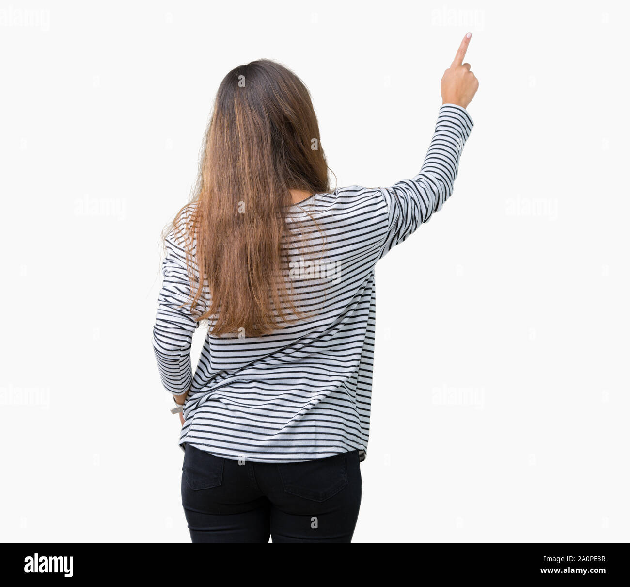 Young beautiful brunette woman wearing stripes sweater over isolated ...