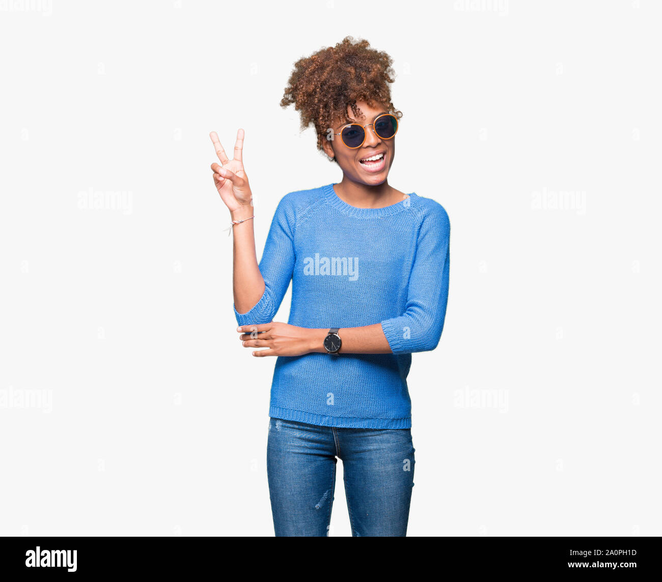 Beautiful young african american woman wearing sunglasses over isolated ...