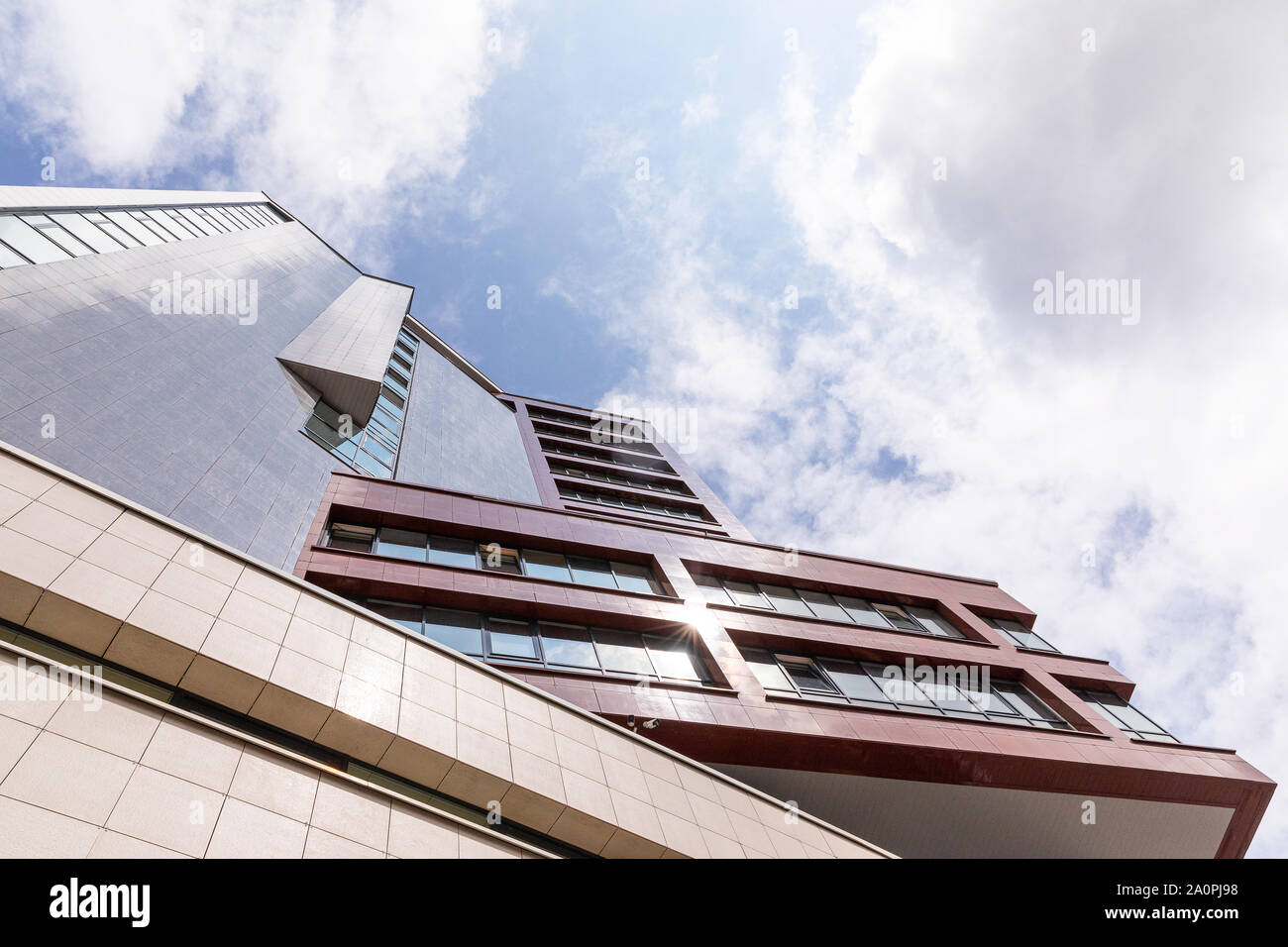 Bottom view of cutting-edge apartment building with geometry design ...