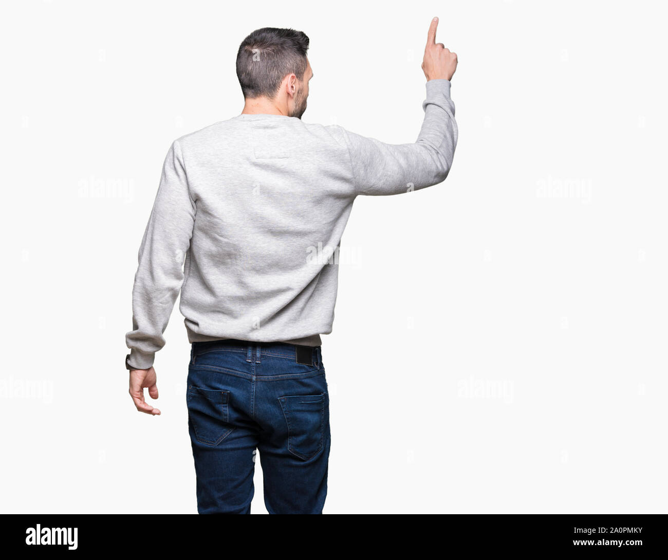 Young handsome man wearing sweatshirt over isolated background Posing ...