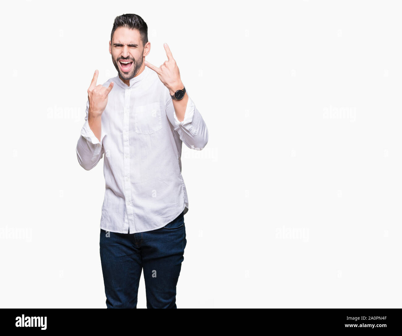 Young business man over isolated background shouting with crazy ...