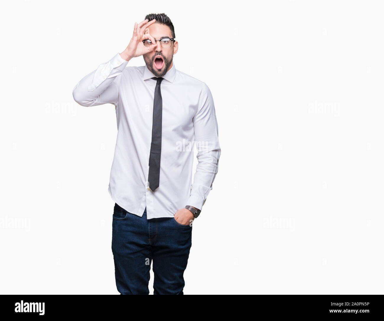 Young handsome business man wearing glasses over isolated background ...