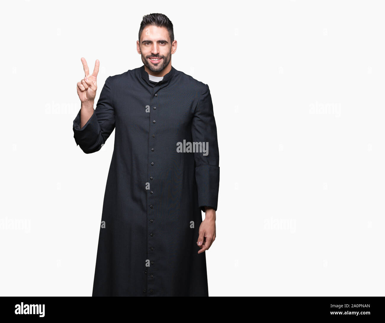 Young Christian priest over isolated background showing and pointing up ...