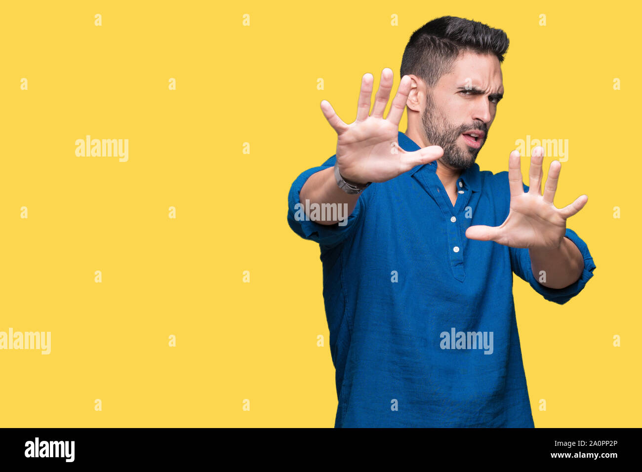 Young handsome man over isolated background afraid and terrified with ...