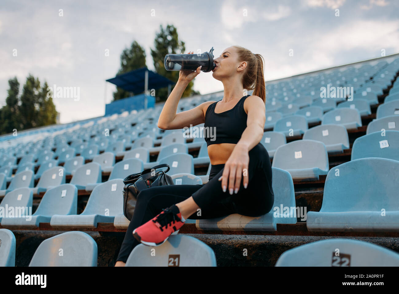 Runner sitting hi-res stock photography and images - Alamy