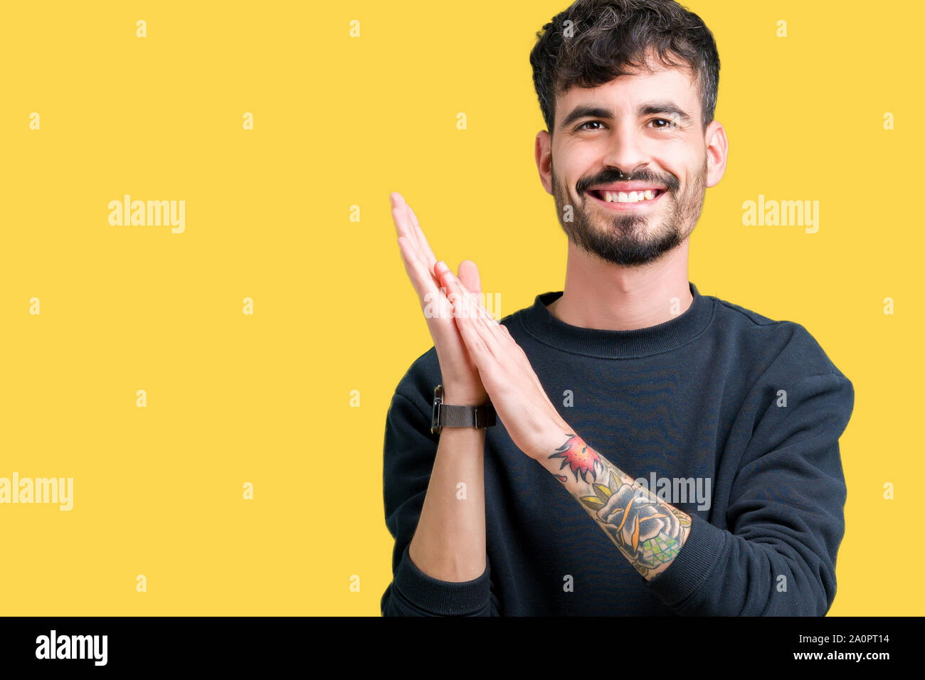 Young handsome man over isolated background Clapping and applauding ...