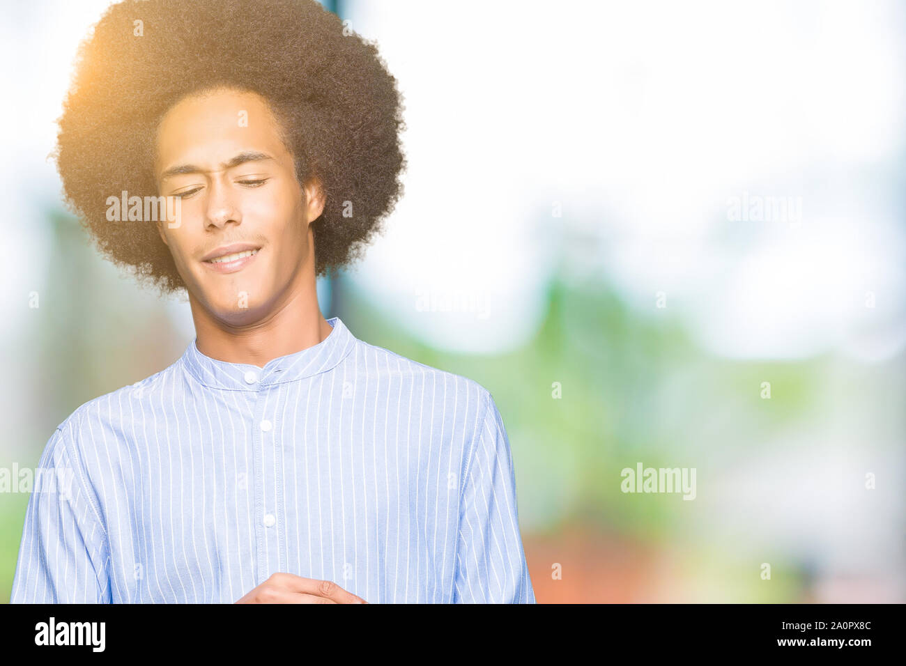 Young african american man with afro hair disgusted expression ...