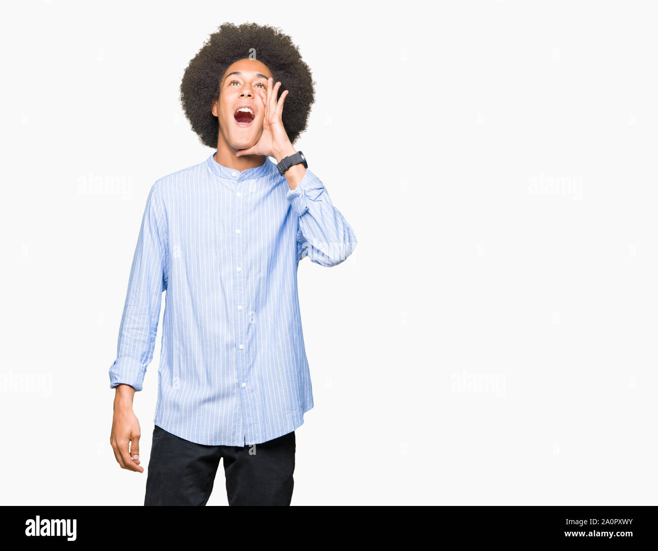 Young african american man with afro hair shouting and screaming loud ...