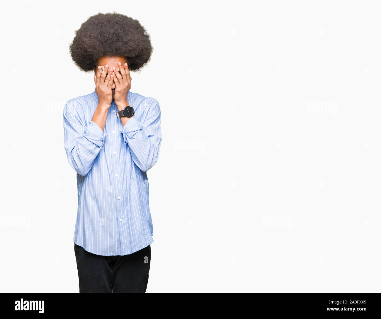 Young african american man with afro hair with sad expression covering ...