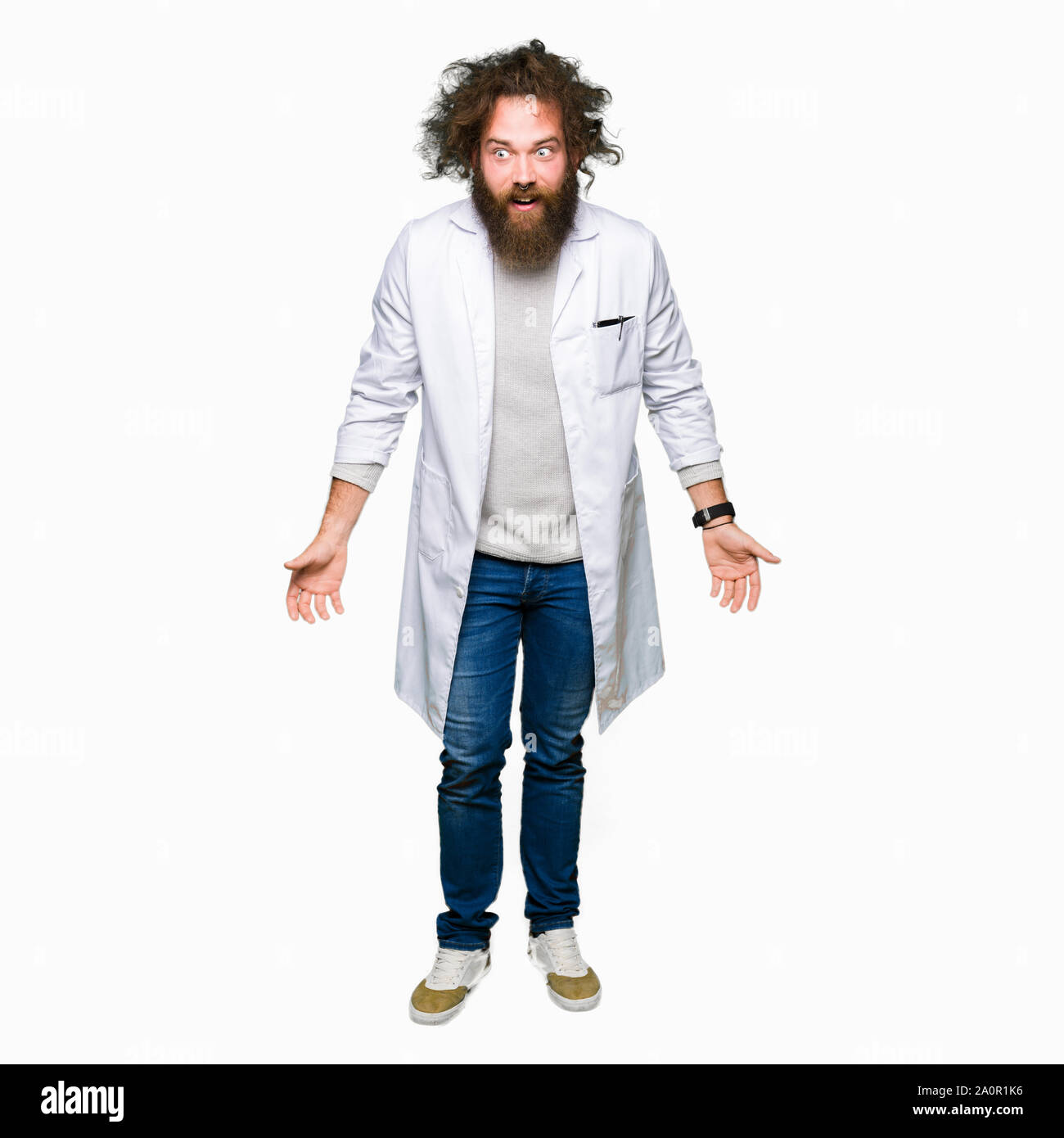Crazy scientist with funny long hair afraid and shocked with surprise ...
