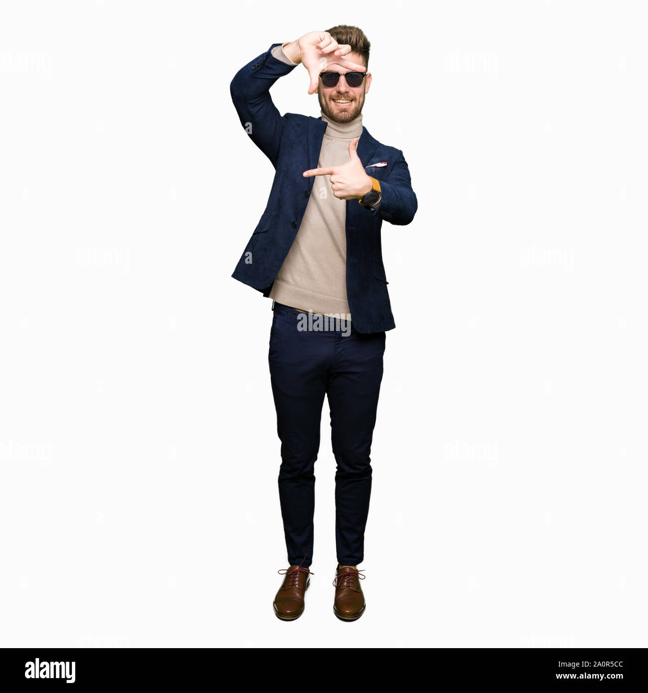 Young happy man framing Cut Out Stock Images & Pictures - Alamy