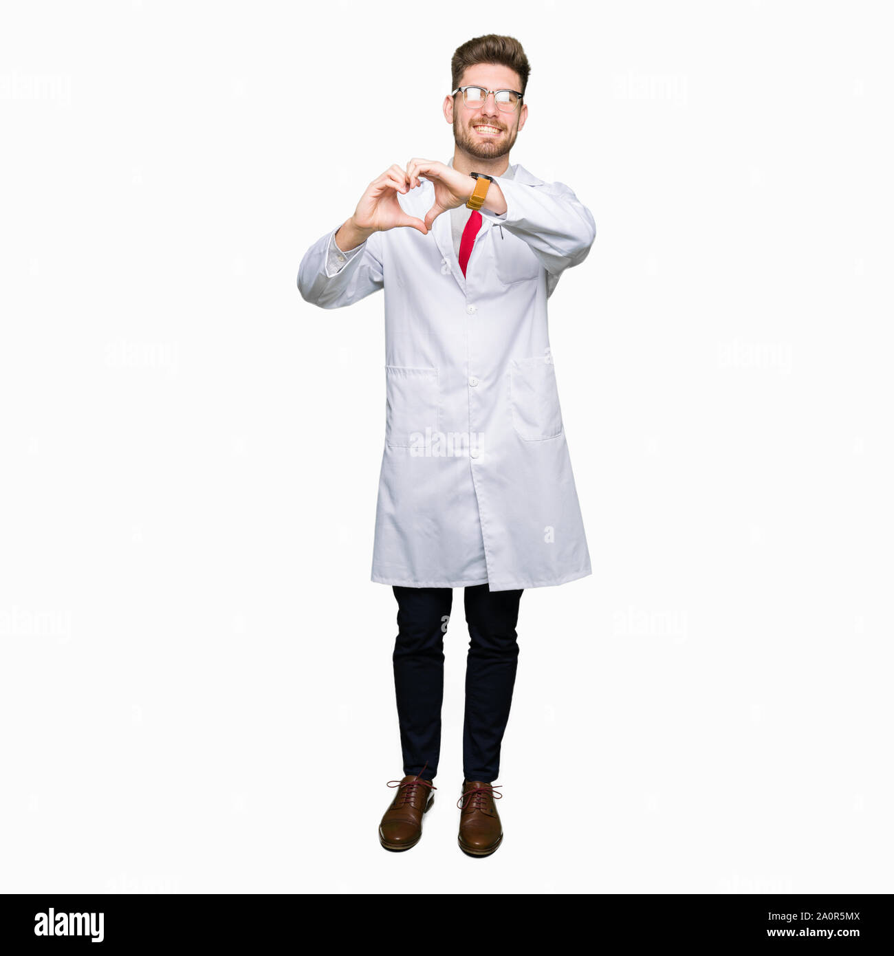 Young handsome scientist man wearing glasses smiling in love showing ...